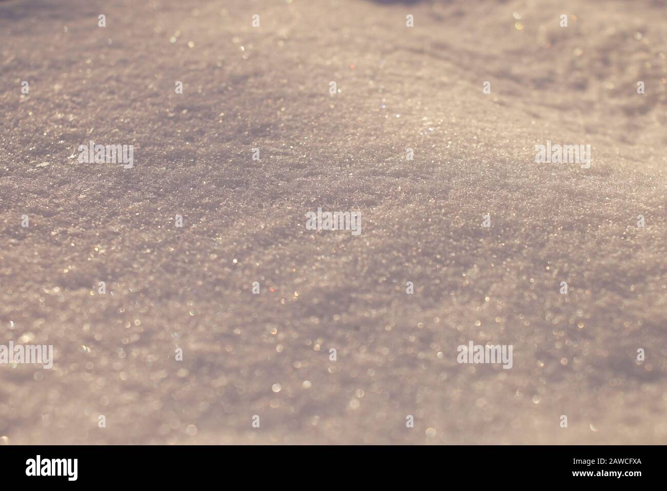 Sparkling snow in the sunlight for background Stock Photo - Alamy