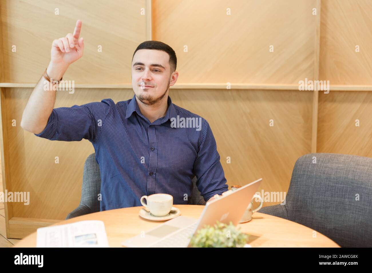 Man calling waiter hi-res stock photography and images - Alamy