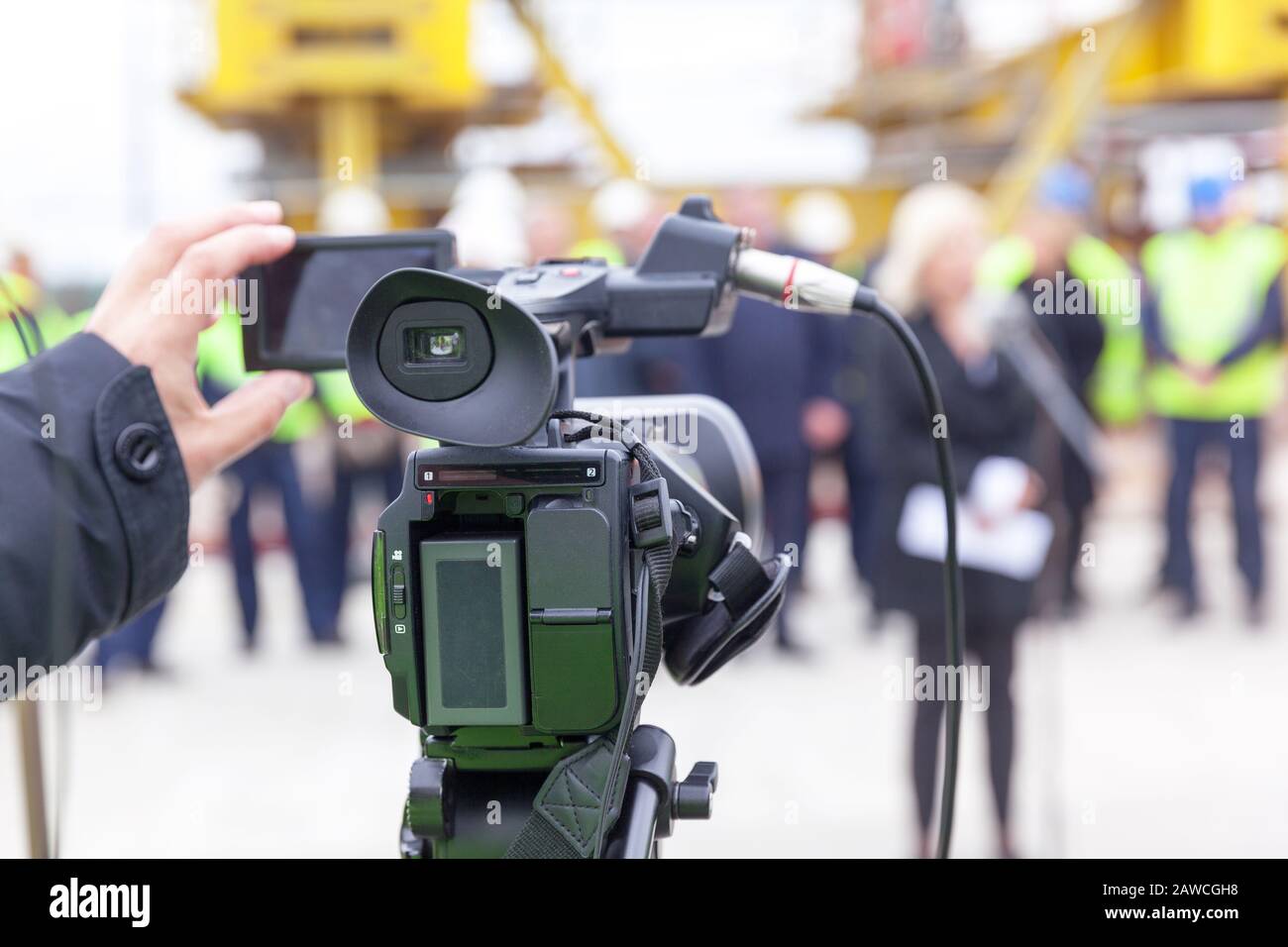 Press conference. Filming media event with a television camera Stock ...