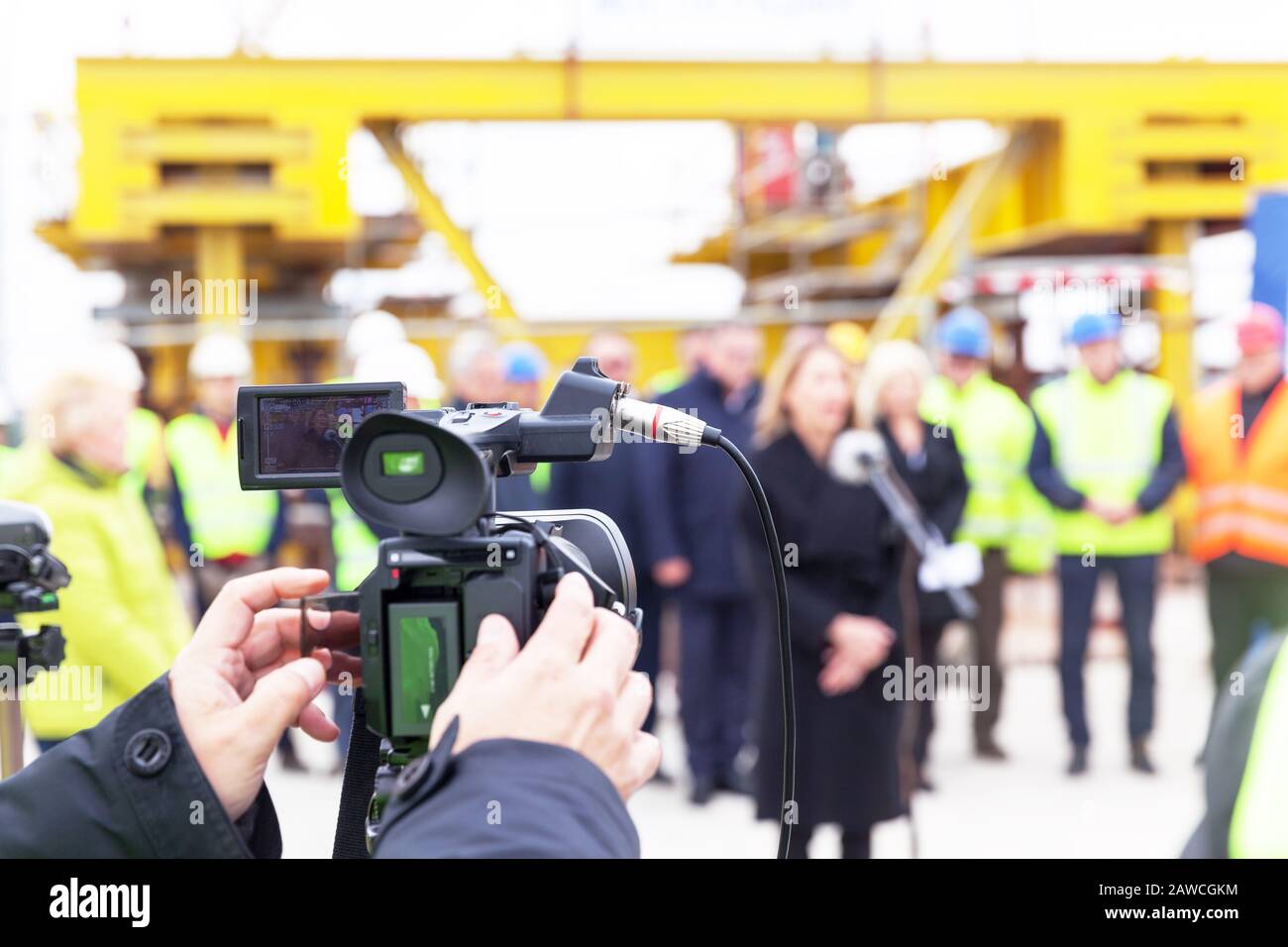 News conference. Filming media event with a television camera Stock ...