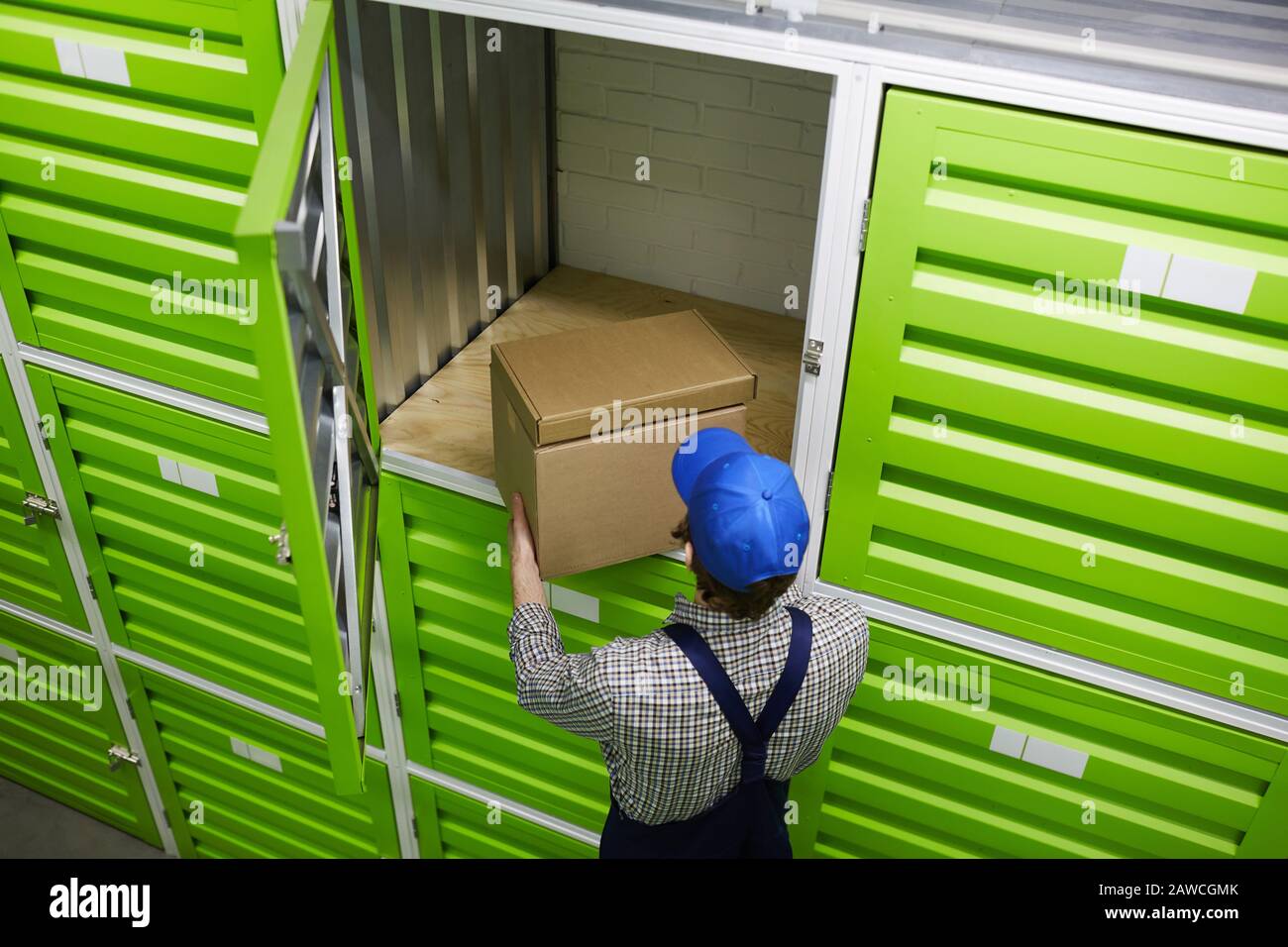 Putting inside crate hi-res stock photography and images - Alamy