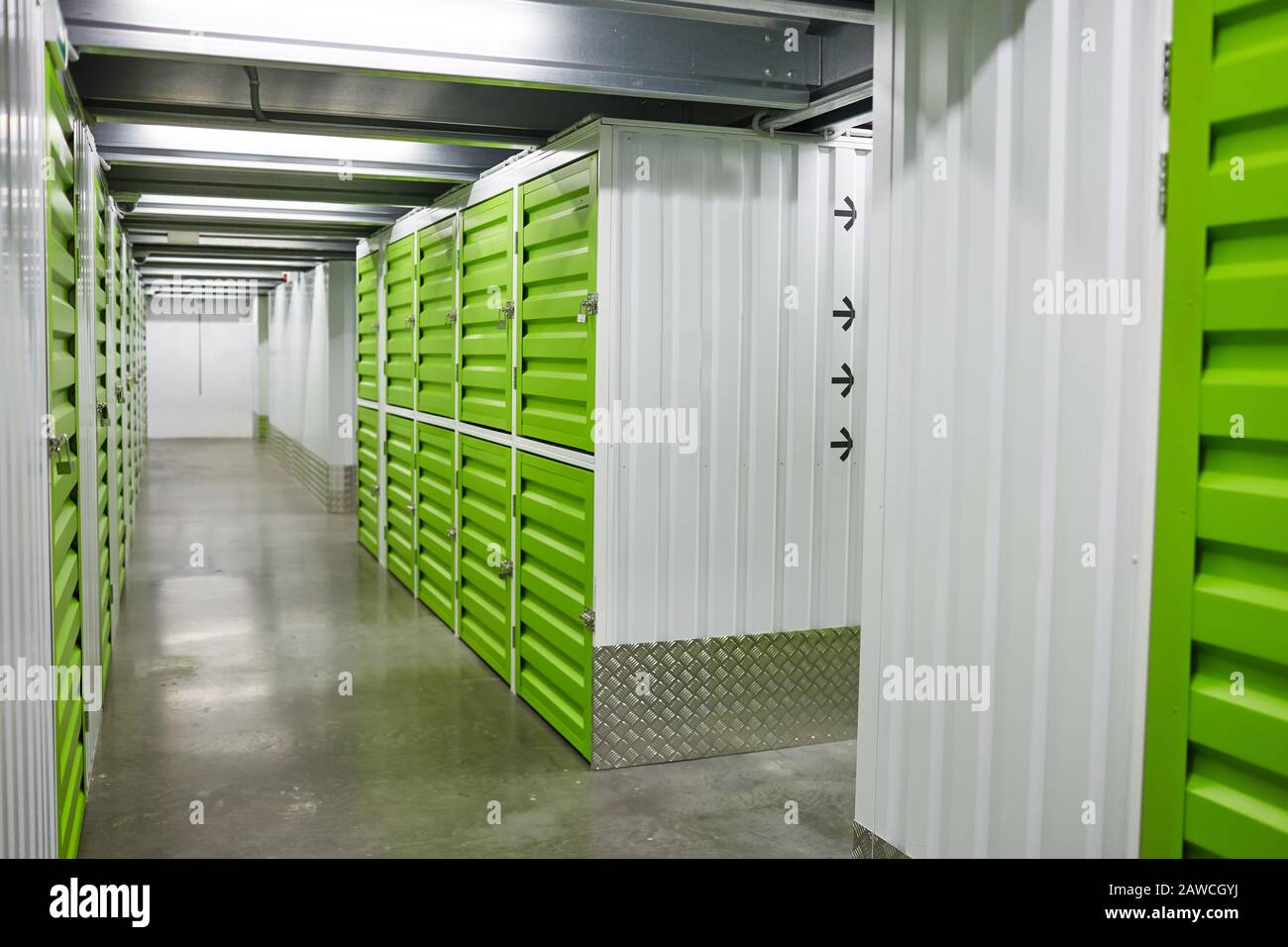 Image of empty warehouse with green chambers for boxes Stock Photo - Alamy