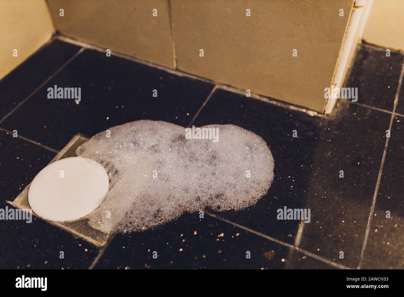 Abstract bubbles white foam of washing powder on grey floor.bubbles ...