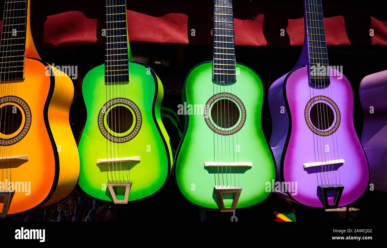 Colorful Mexican guitars on display Stock Photo - Alamy