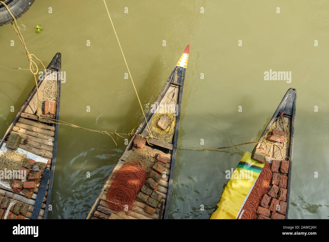 Traditional wooden fishing boat in river Hooghly or Ganga. Kolkata ...