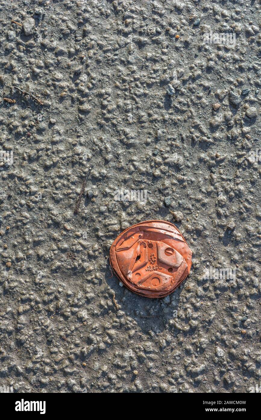 Unknown brand of takeaway coffee cup lid (assuming coffee) on tarmac ...