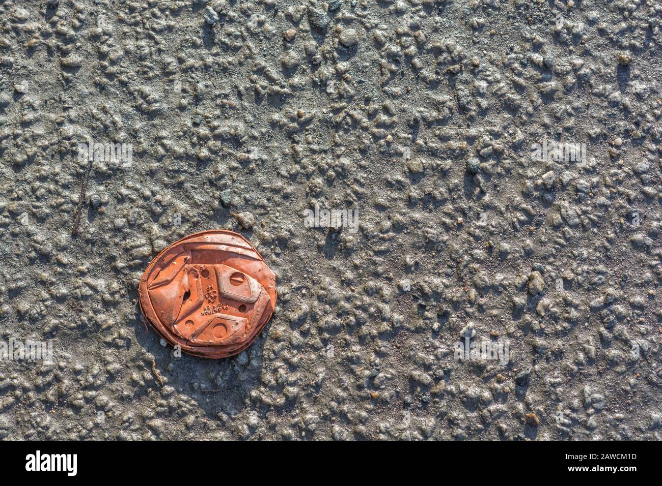 Unknown brand of takeaway coffee cup lid (assuming coffee) on tarmac ...
