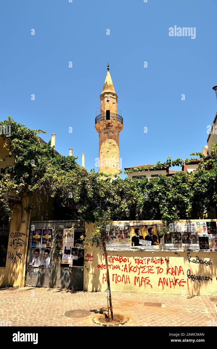 Corfu - 4th July 2018:colourful graffiti and posters below the grape ...