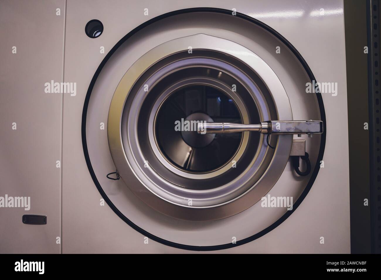 Washing machine in dry cleaning close-up dry cleaning Stock Photo - Alamy