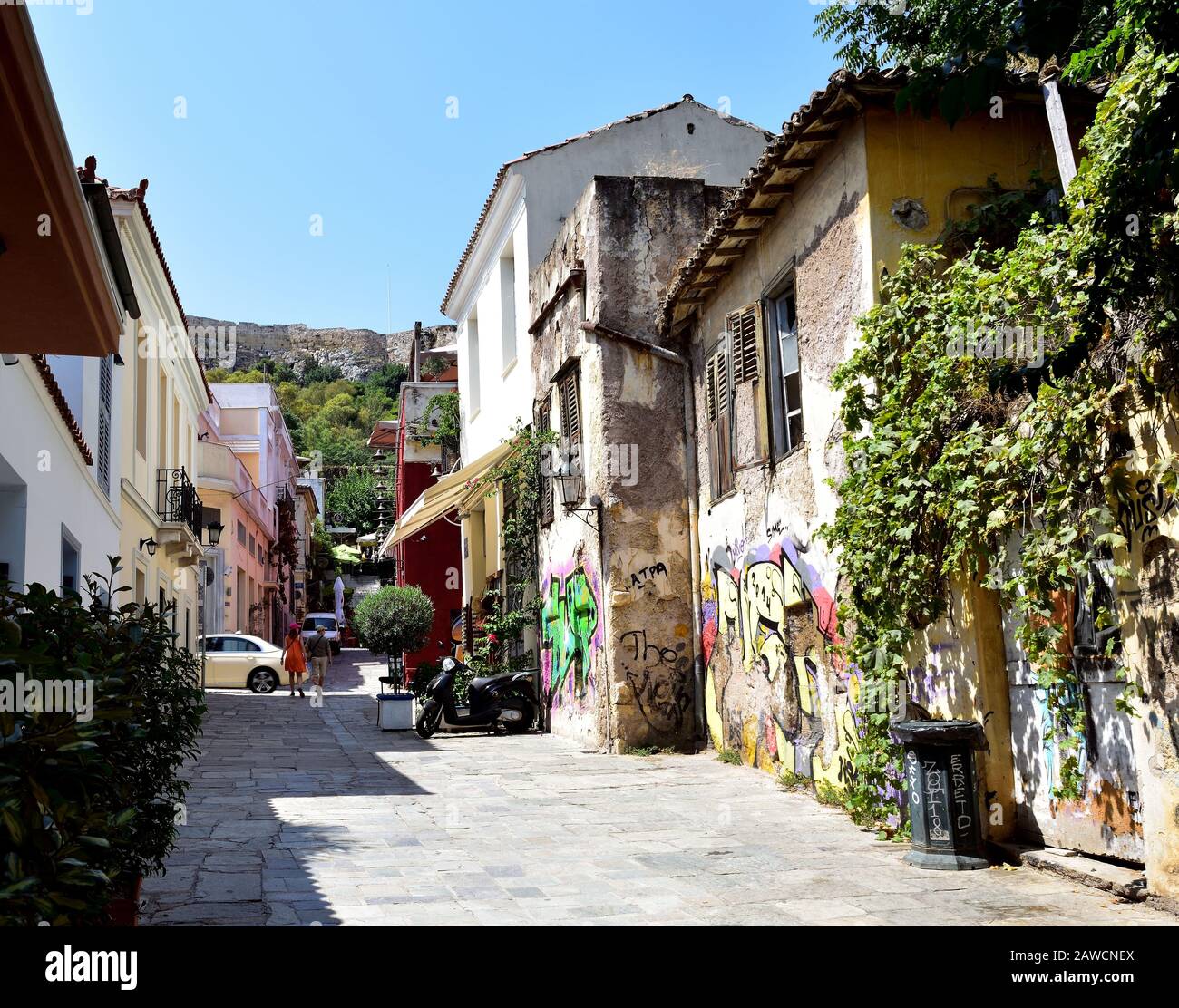 Athens, Greece - 7th July 2018:Sunshine on a quiet stree below the ...