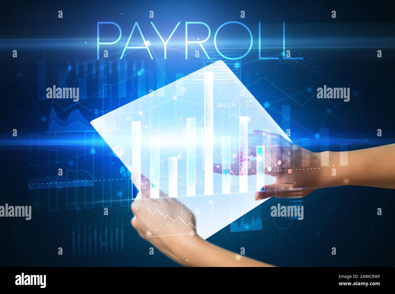 Hand holding futuristic tablet with PAYROLL inscription above, modern ...