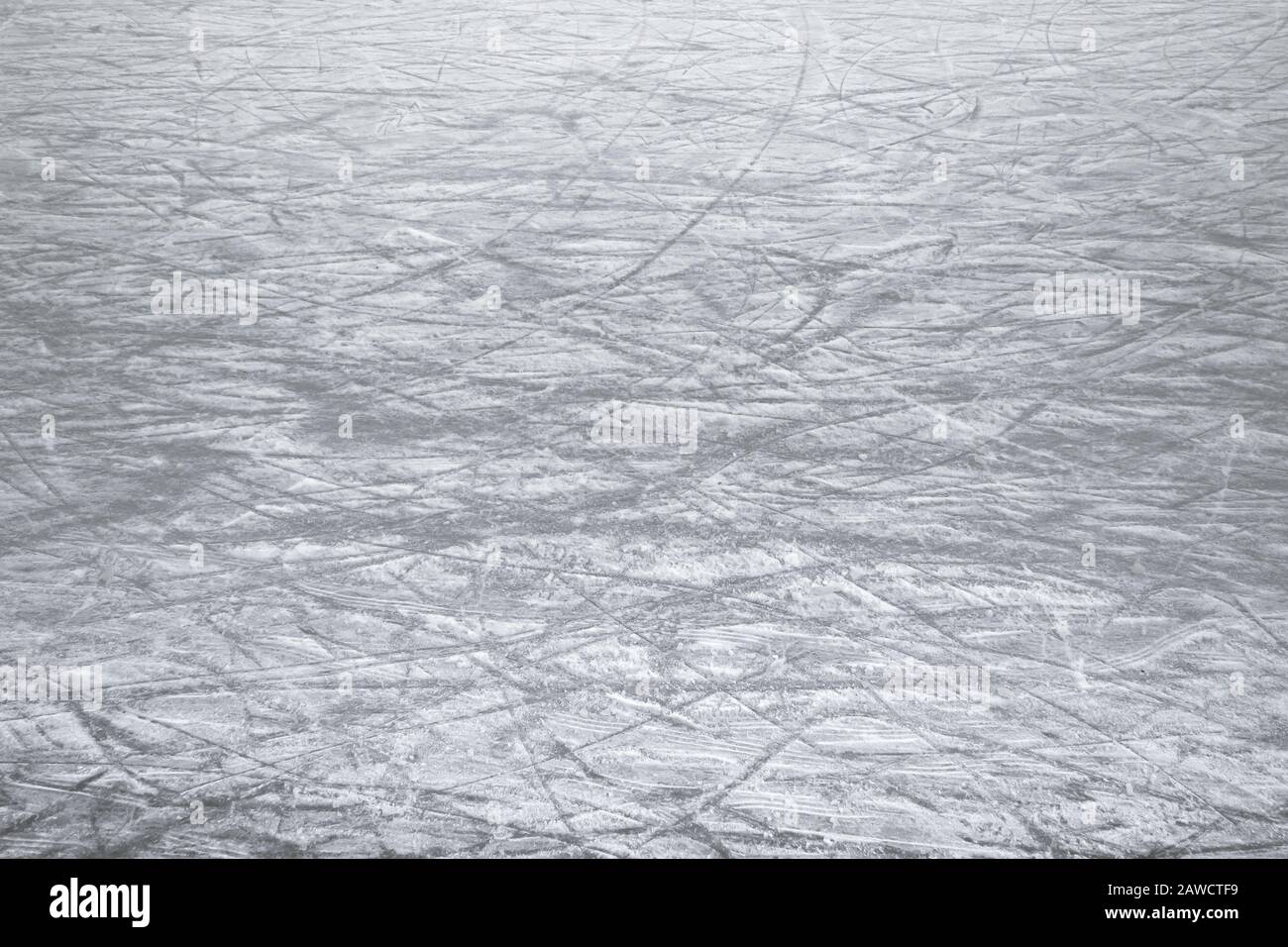 Scratches of skates on the ice of skating-rink. Ideal for concepts and ...