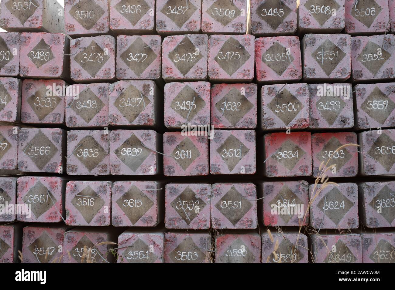 Stacked concrete electric pole on the ground prepare to use Stock Photo ...