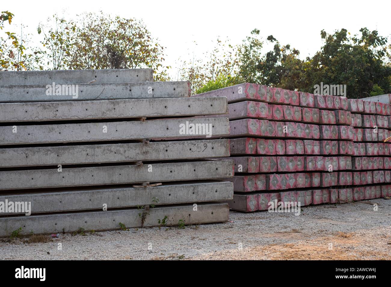 Stacked concrete electric pole on the ground prepare to use Stock Photo ...