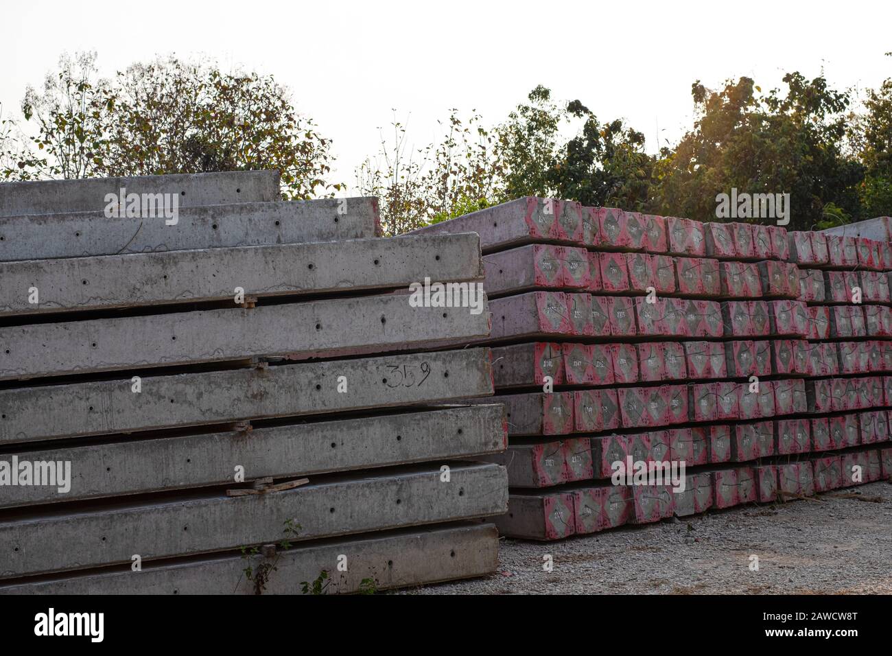 Stacked concrete electric pole on the ground prepare to use Stock Photo ...