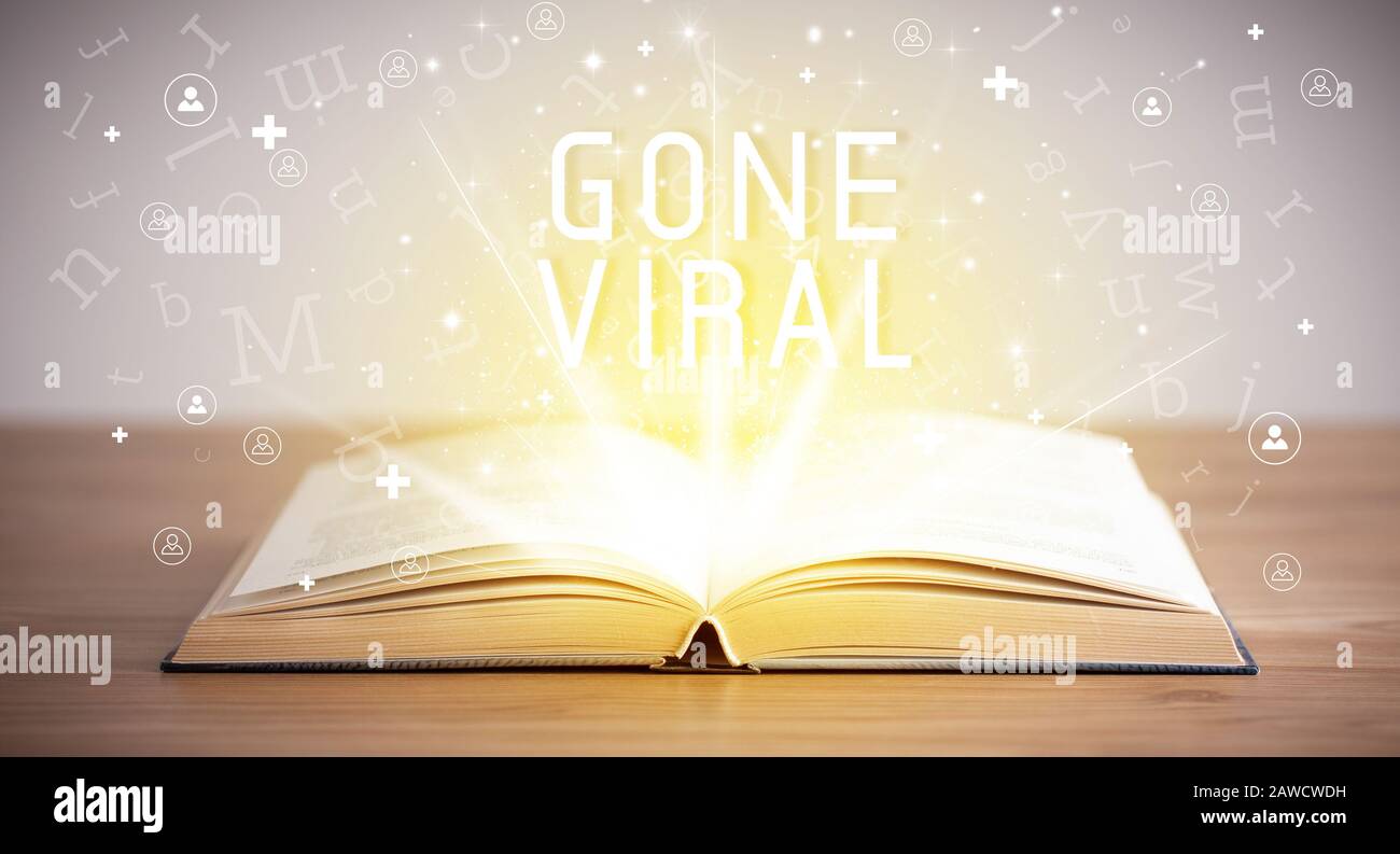 Open book with GONE VIRAL inscription, social media concept Stock Photo ...