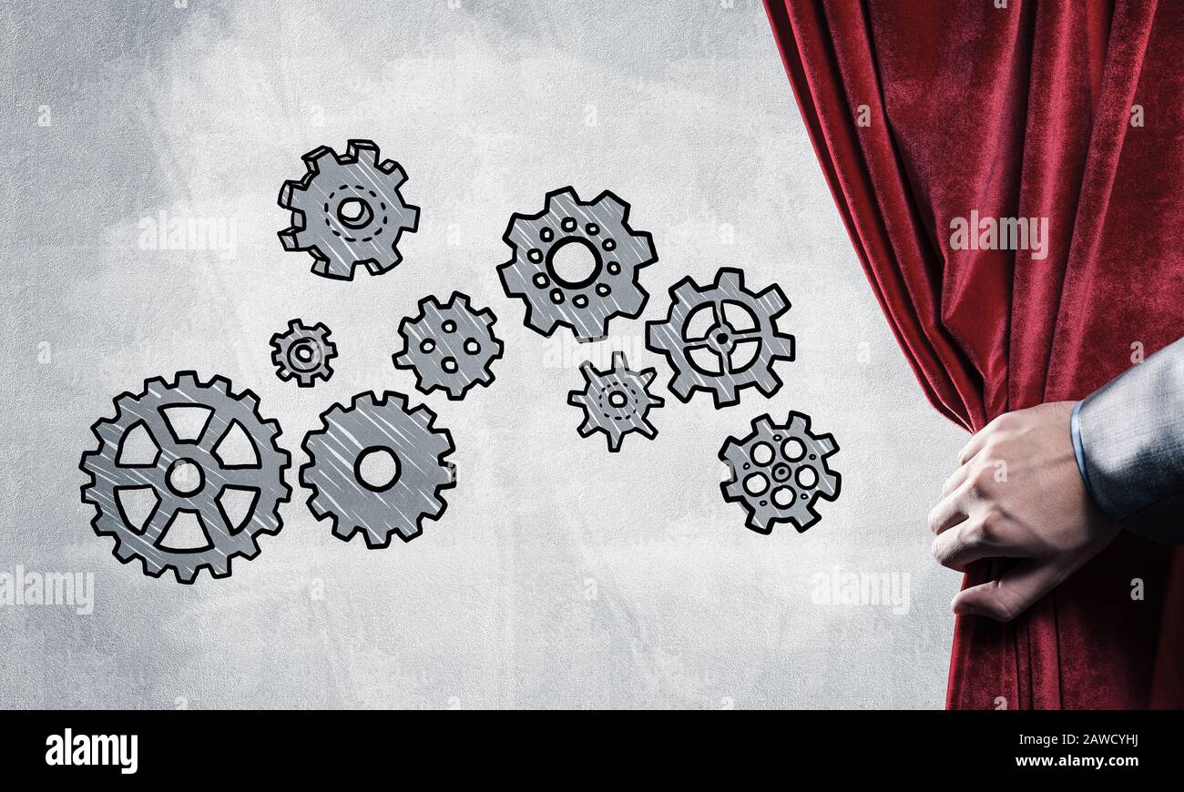 Concrete wall behind drapery curtain and hand opening it Stock Photo ...