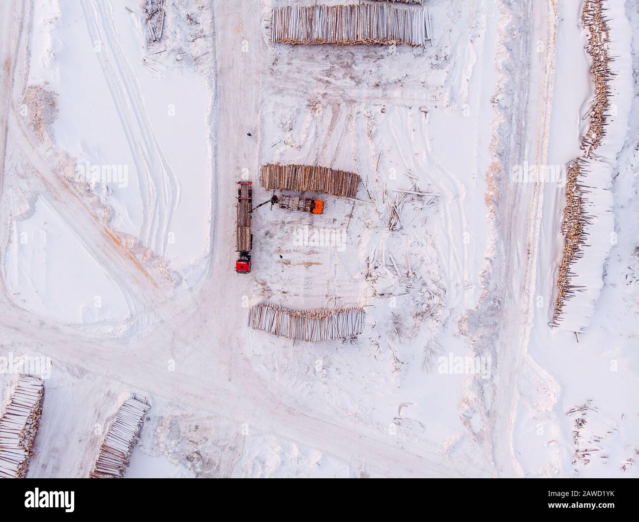 Log storage forest, winter logging, sawmill, top view, aerial photo ...
