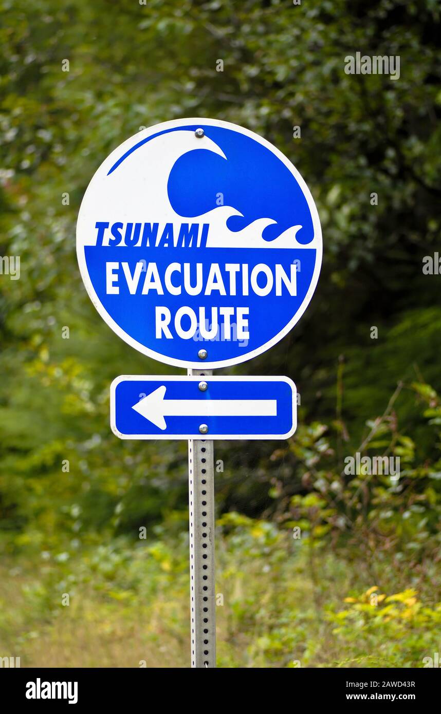 A highway sign marking Tsunami Evacuation Route along the coast of ...