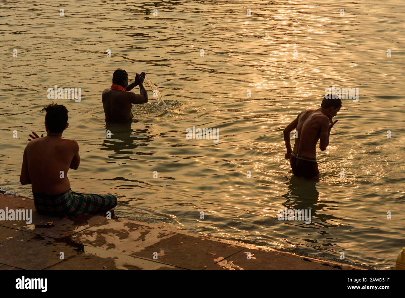 Indian people bathing in river Hooghly or Ganga at Mallick ghat in ...