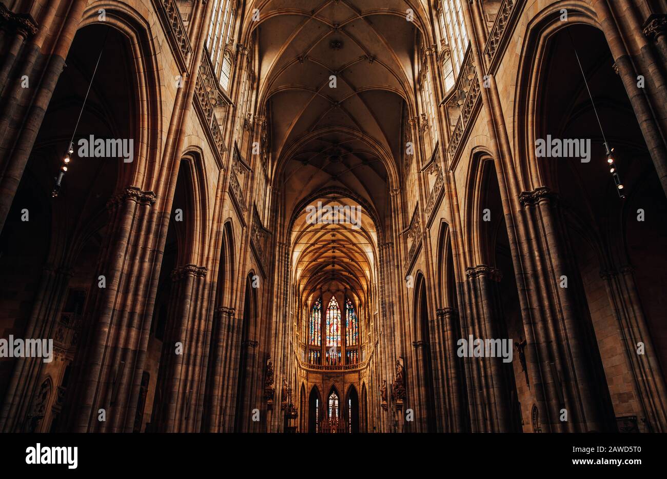 Interior of Gothic Cathedral inside. Carved pulpit, stained-glass ...