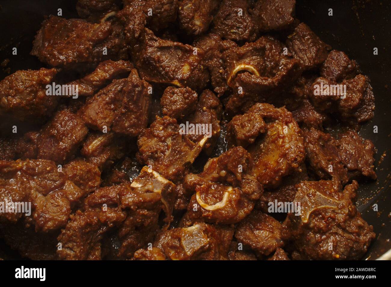 Mutton curry cooking Stock Photo - Alamy