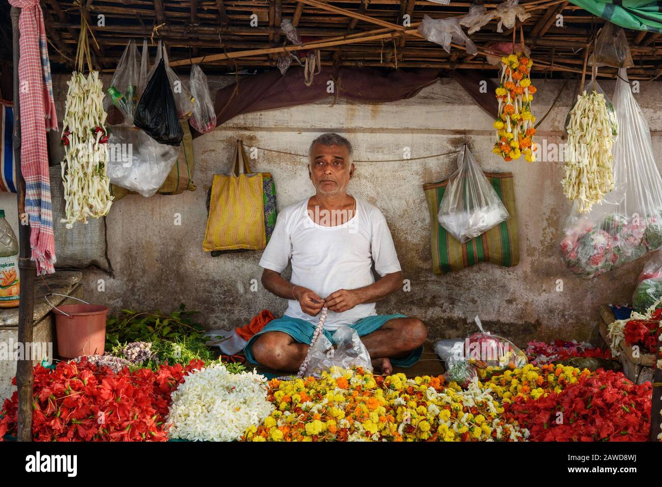 Indian seller on Flower market at Mallick Ghat in Kolkata. India Stock ...