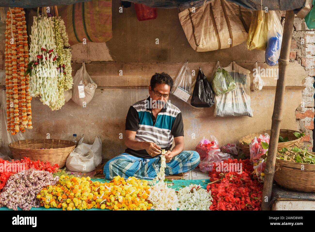Indian seller on Flower market at Mallick Ghat in Kolkata. India Stock ...