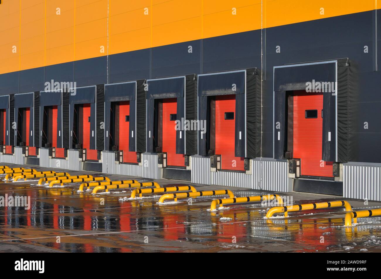 Front view of loading docks of a modern logistics center. Logistics ...