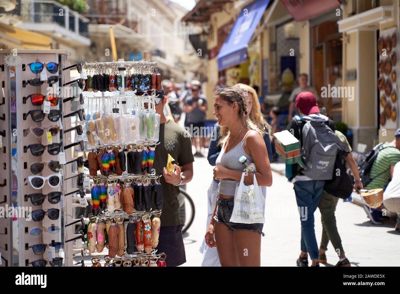 Athens, Greece - May 18 2019: Tourists walk the streets lined with ...