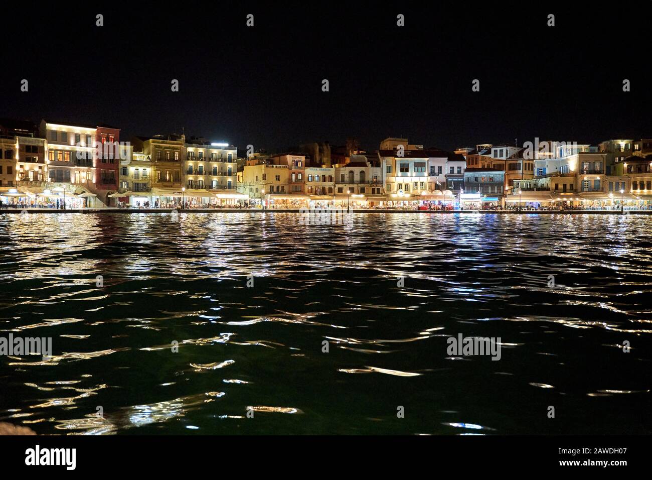 venetian harbour lighthouse in Chania, Crete, Greece at night, long ...