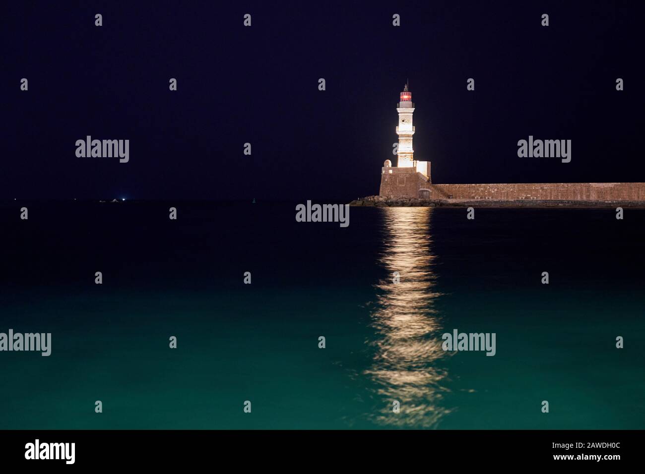 venetian harbour lighthouse in Chania, Crete, Greece at night, long ...