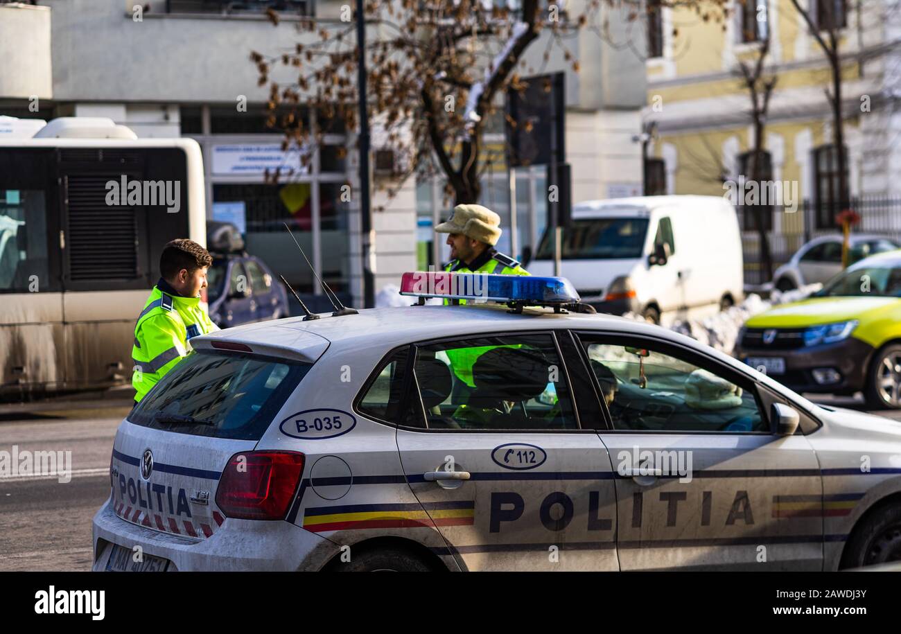 Police agents, Romanian Traffic Police (Politia Rutiera) directing ...