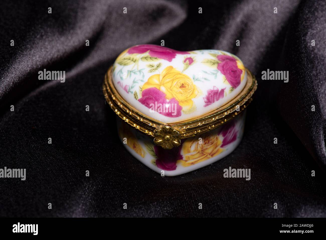 An artificial cubic zirconium gem on a black fabric Stock Photo - Alamy