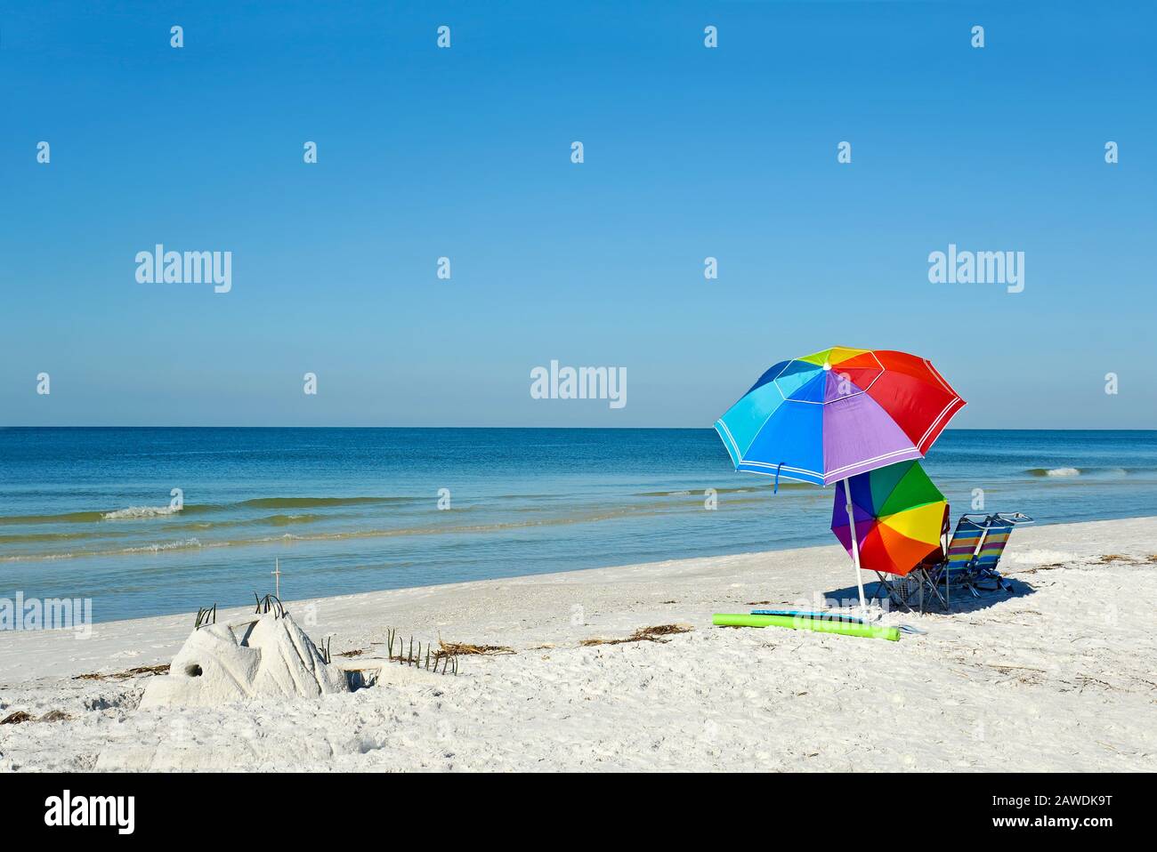 Multi-Colored Beach Umbrellas and Chairs on the Beach Stock Photo - Alamy