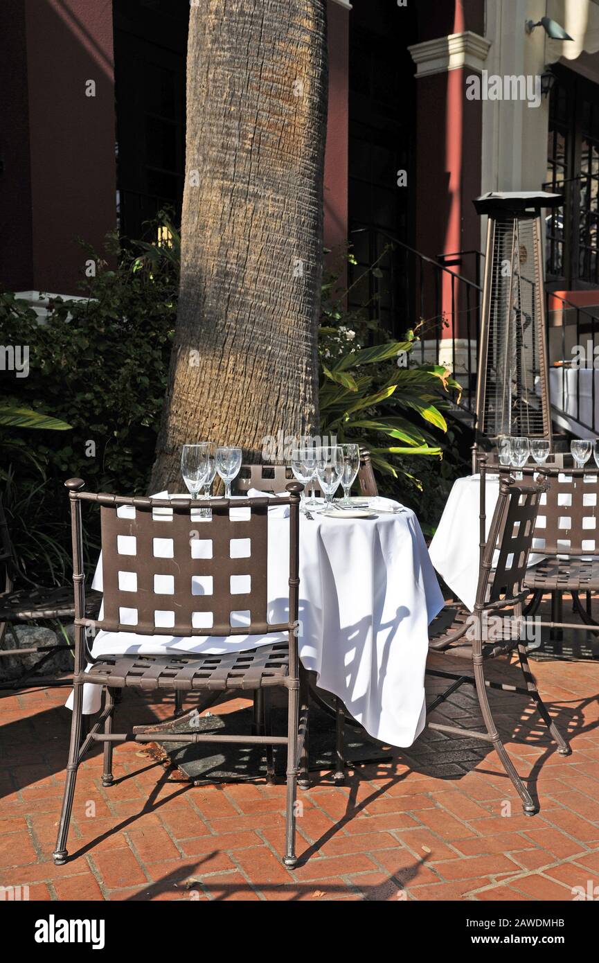 Outdoor Dining Table on a Cafe Terrace Stock Photo - Alamy