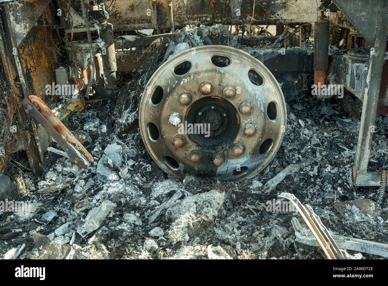 The wheel of a burned out motor home Stock Photo - Alamy