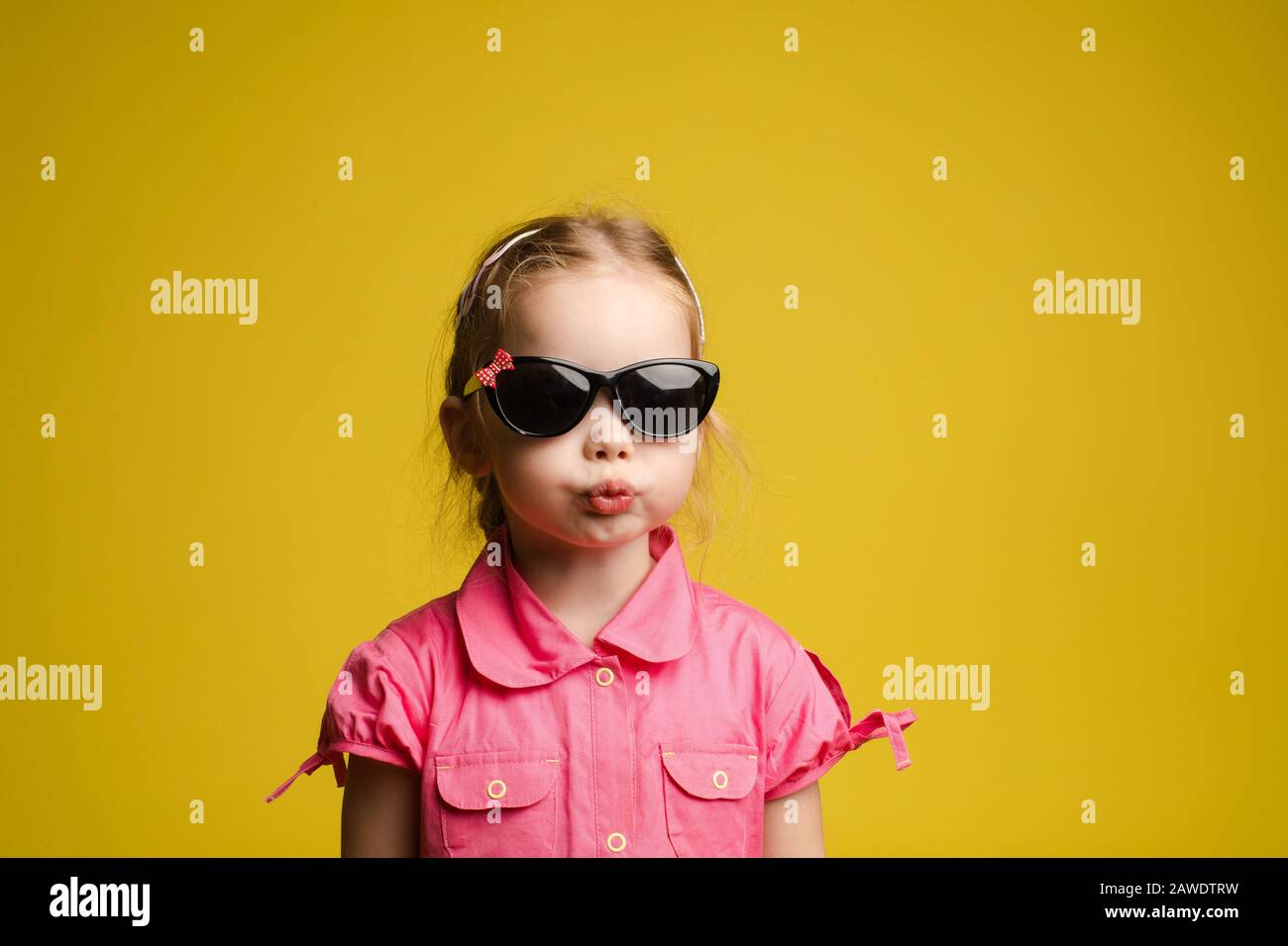 Funny girl pouting her lips. Stock photo portrait of adorable little ...