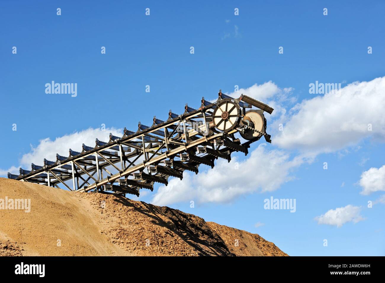 Reclaimer Boom with Scraper Chains and Flights reclaiming material in a ...