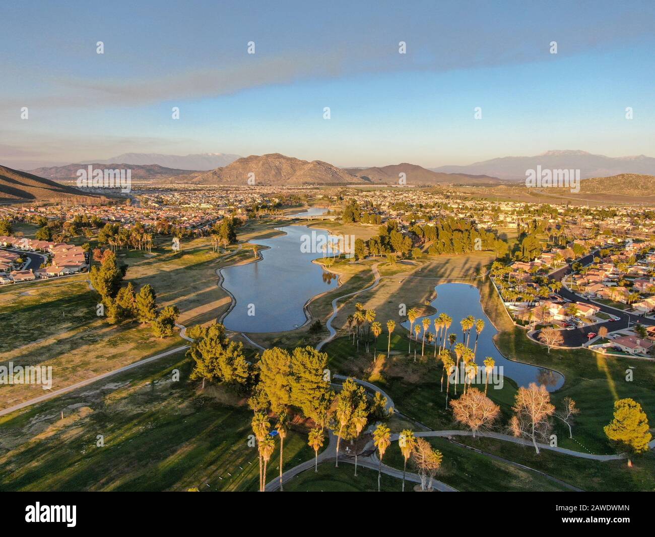 Aerial over grass field surrounded hi-res stock photography and images ...