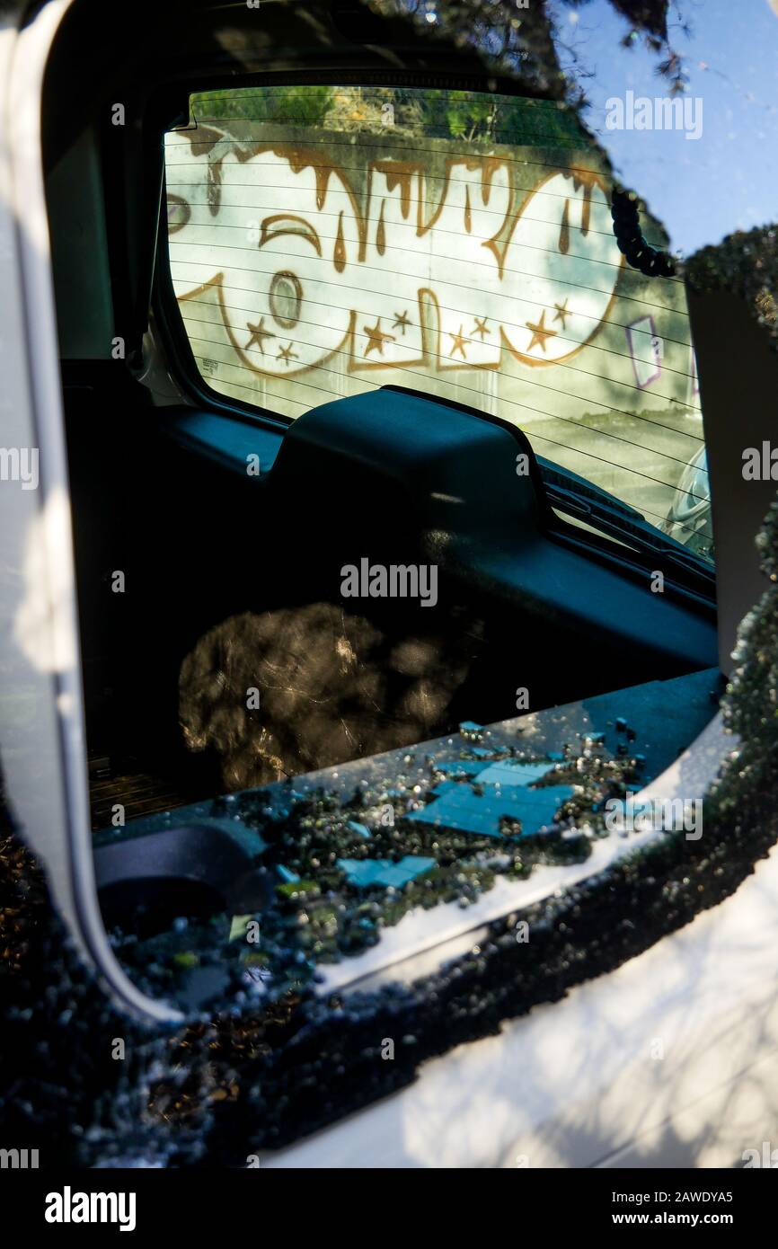 Street view with cars, tag and broken car window, Lyon, France Stock ...