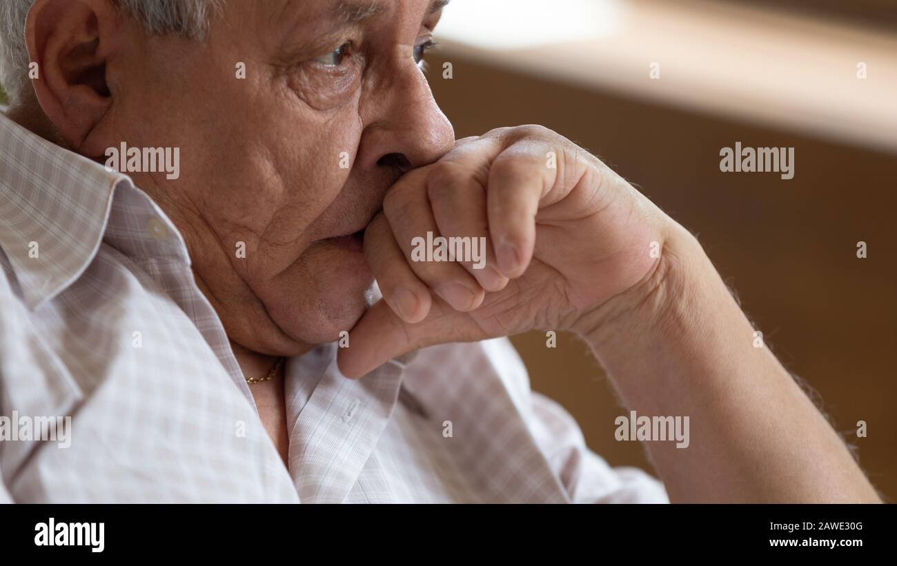 Sad elderly male look in distance mourning Stock Photo - Alamy