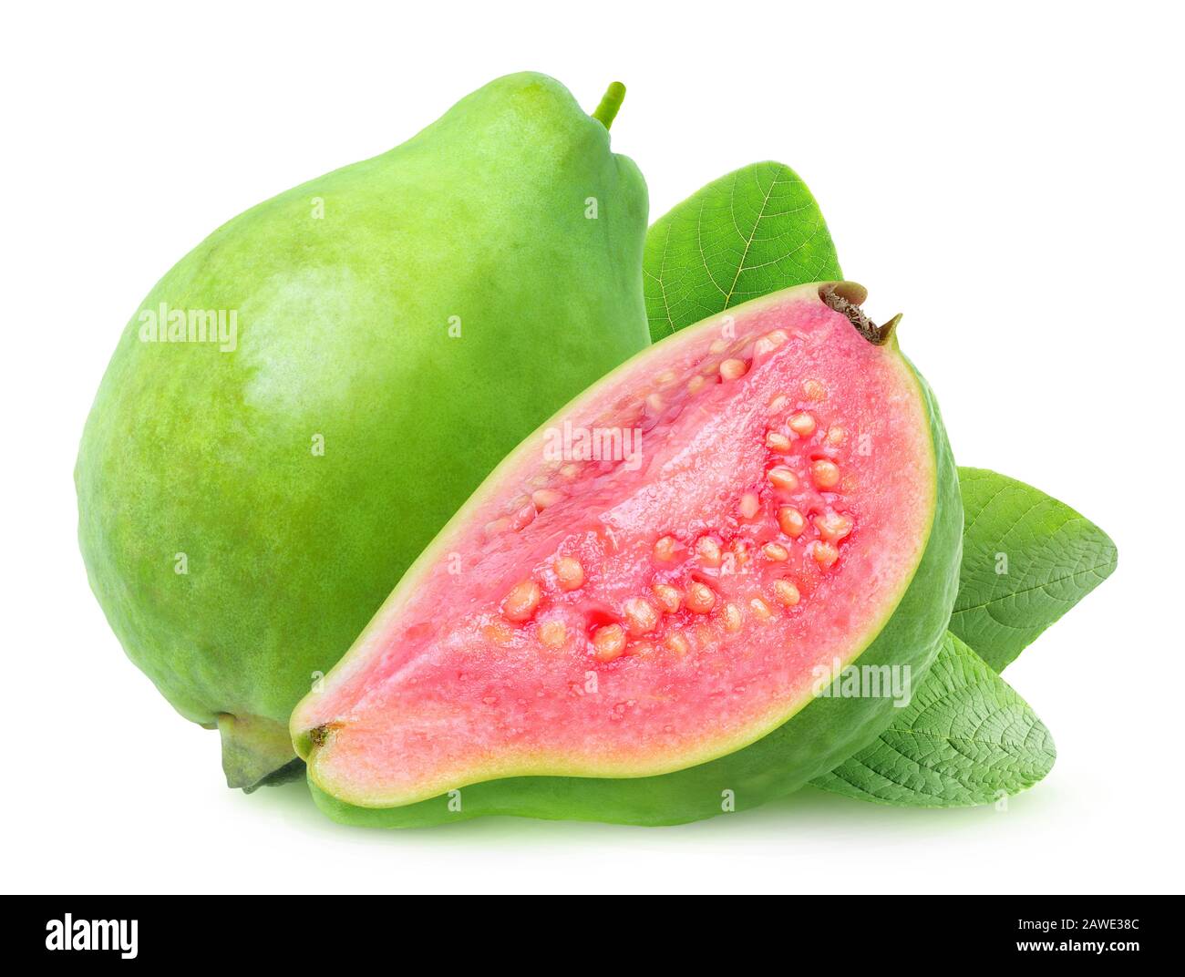 Isolated guava. One whole green guava and a half with pink flesh ...