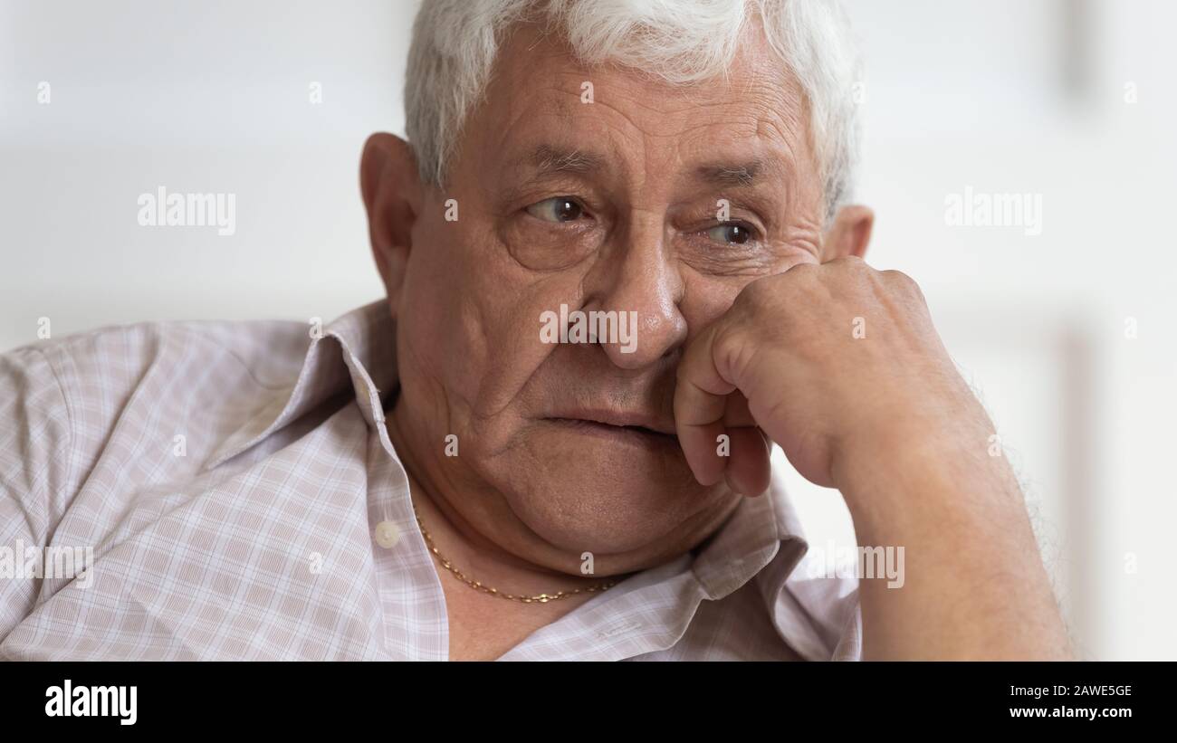 Sad senior man look in distance feeling lonely Stock Photo - Alamy
