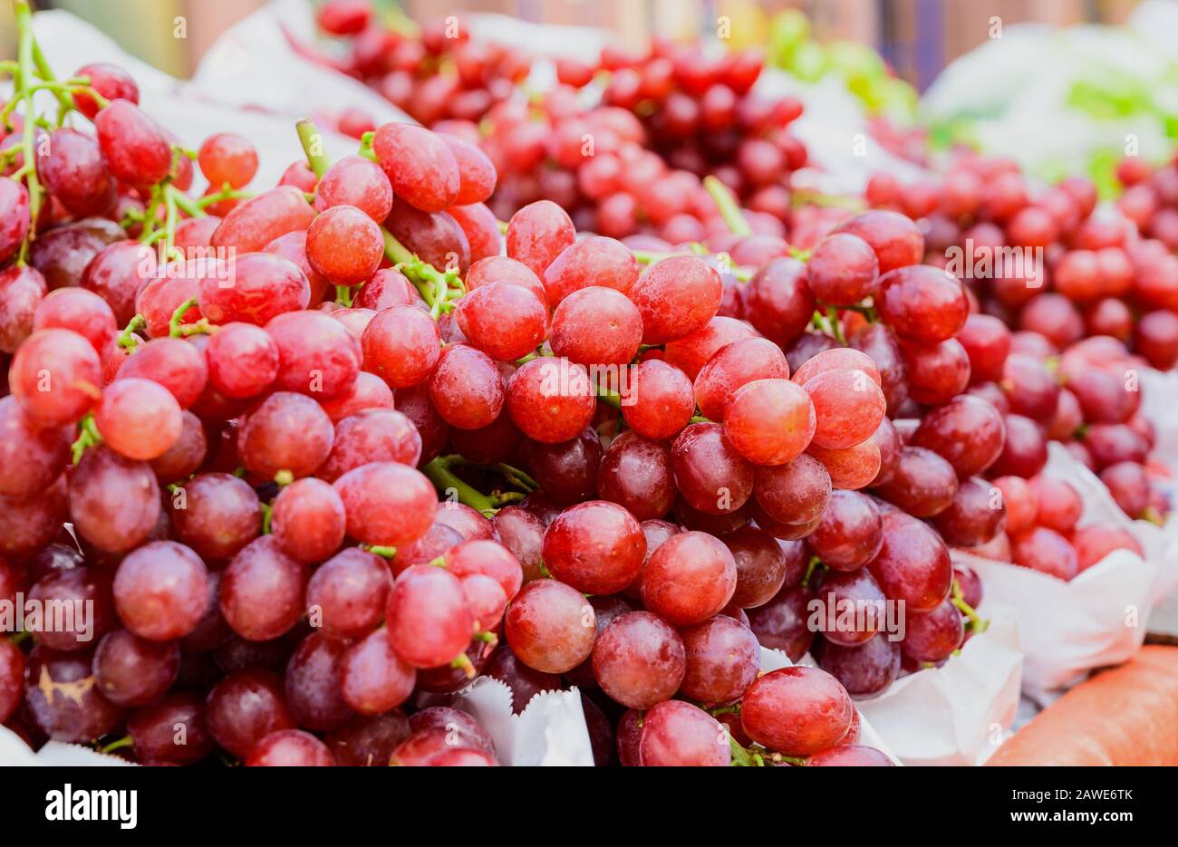 red grape bunches on a German market Stock Photo - Alamy