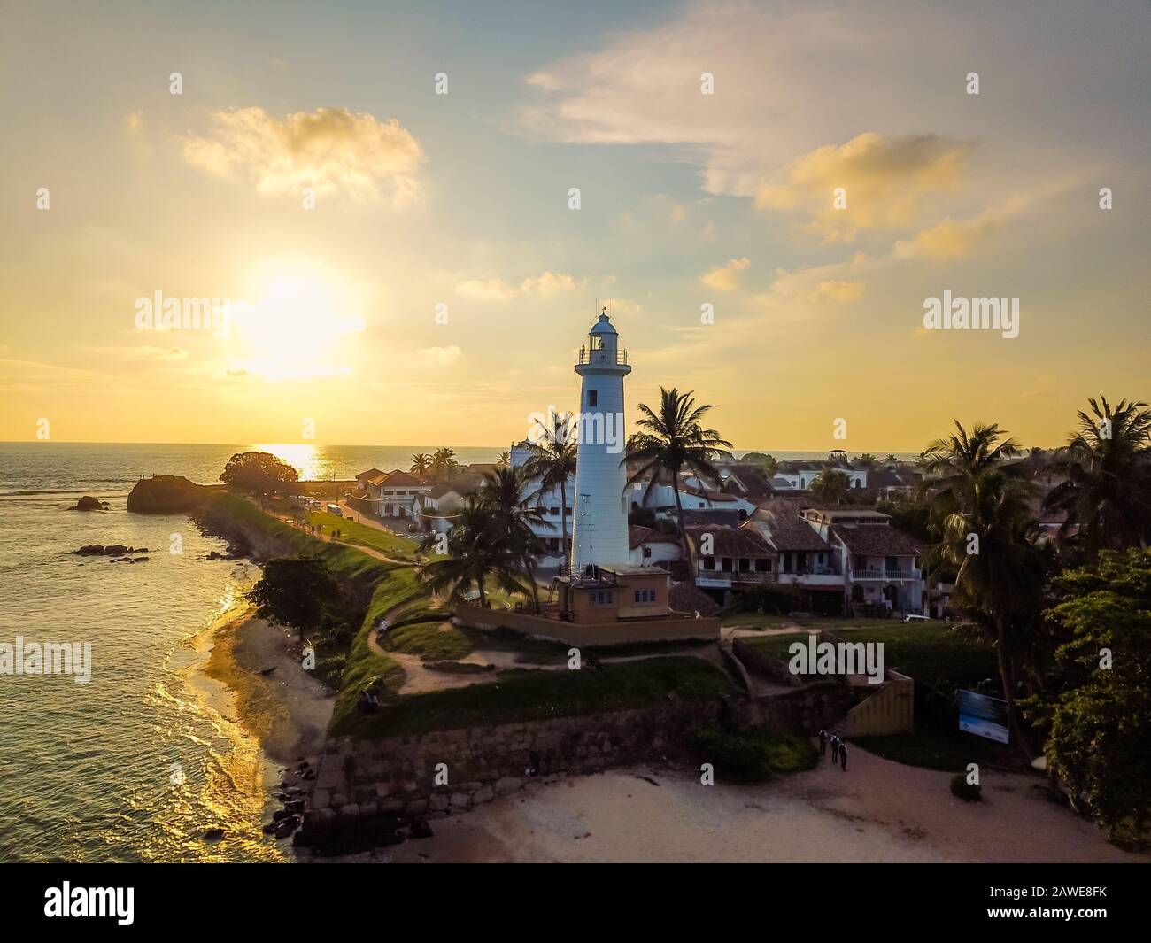 Sunset at the dutch fort lighthouse at Galle in Sri Lanka Stock Photo ...
