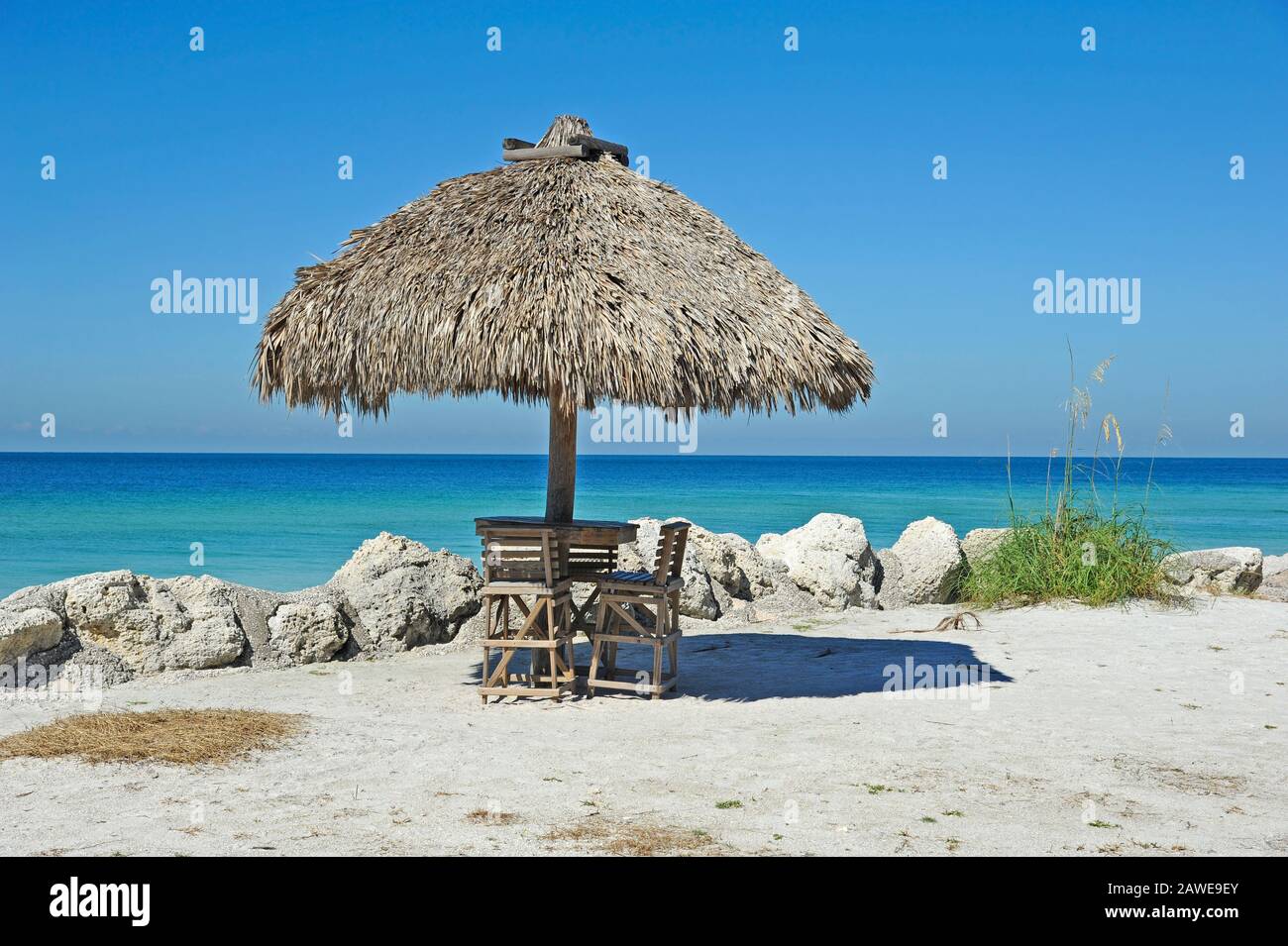 Beach Tiki Hut Bar on the Ocean Stock Photo - Alamy