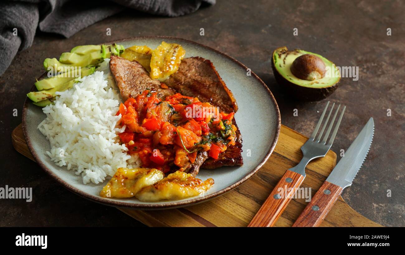 El Bistec a la Criolla - colombian dish traditional - beef steak with ...