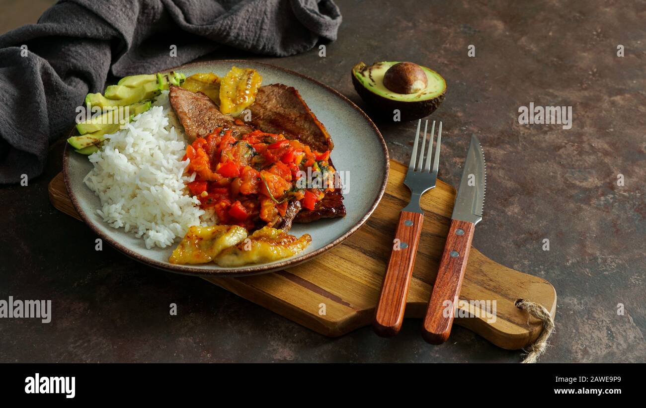El Bistec a la Criolla - colombian dish traditional - beef steak with ...