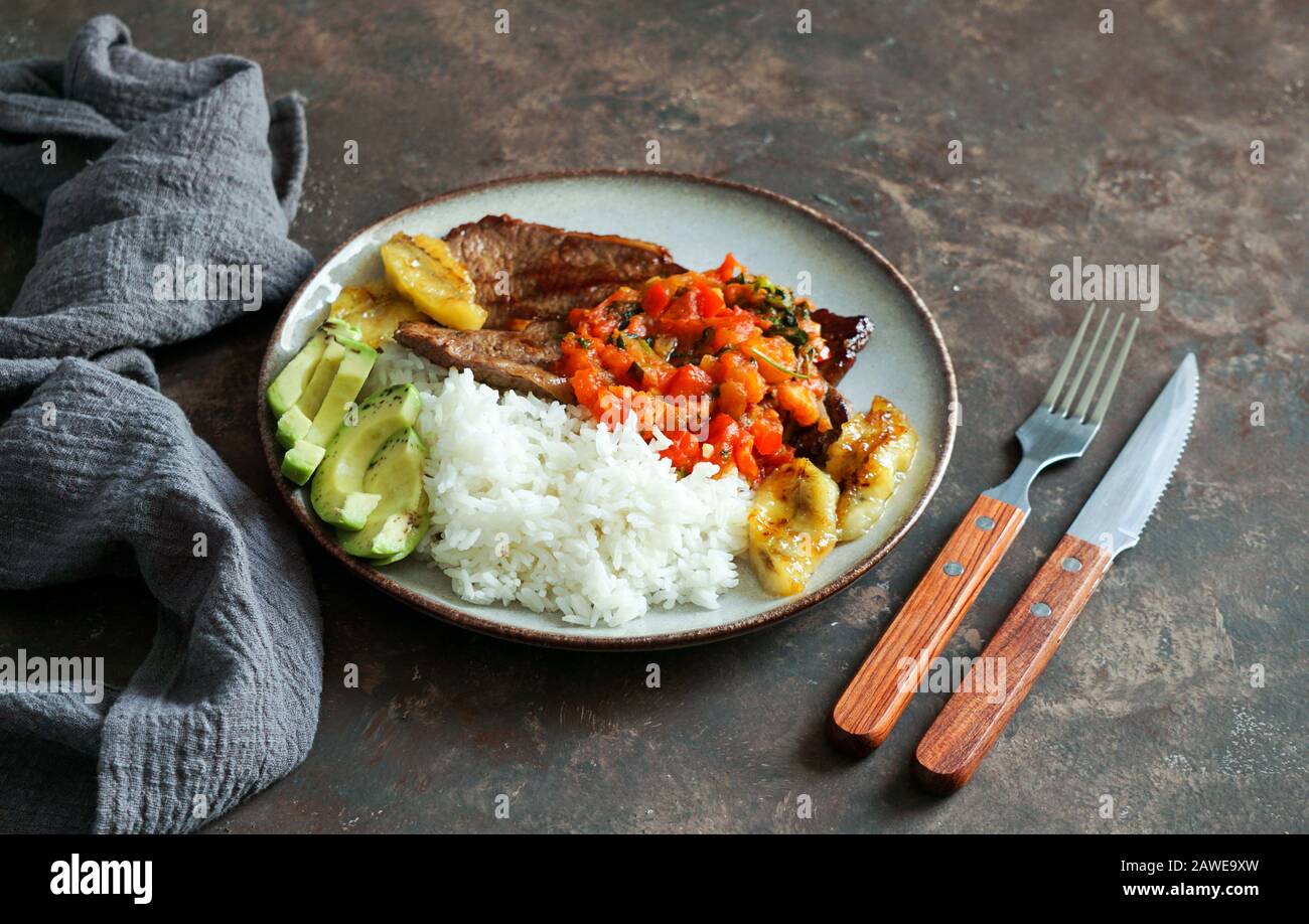 El Bistec a la Criolla - colombian dish traditional - beef steak with ...